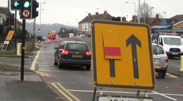 What should you do if the traffic in the left-hand lane is slowing ...